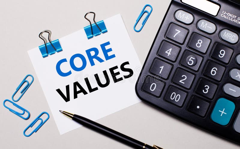 On a Light Background, a Calculator, a Pen, Blue Paper Clips and a ...