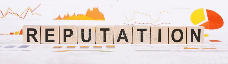 On a Light Background, Graphs, Diagrams and Wooden Cubes with the Word ...