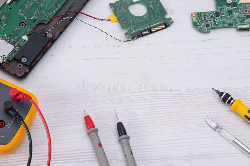 On a Light Background, a Set of Tools for Repairing and Replacing ...