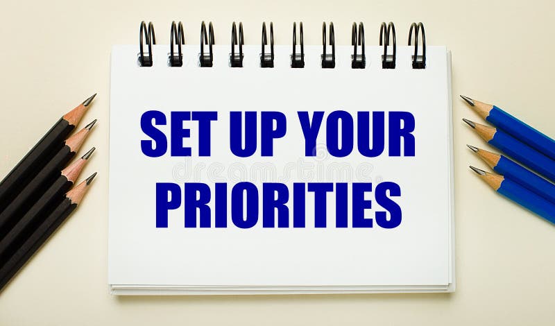 On a Light Background, a White Notebook with the Text SET UP YOUR ...