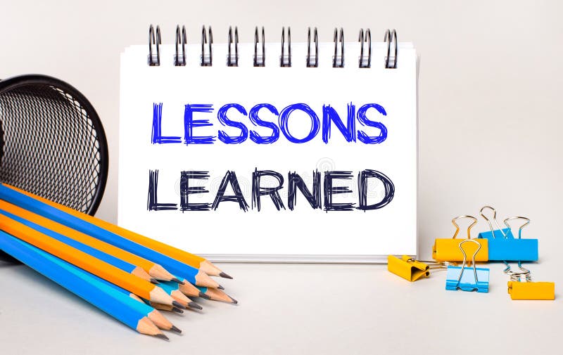 On a Light Background, Yellow and Blue Pencils and Paper Clips and a ...