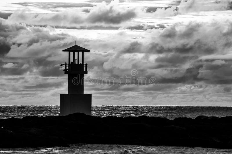 Light beacon at sunset BW stock photo. Image of light - 94207202