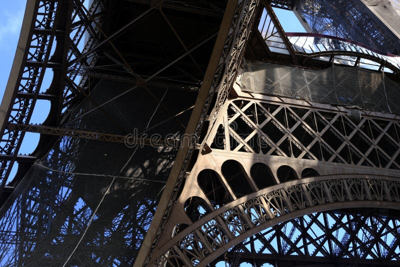 Light Beam on Gigantic Curve of Eiffel Tower. Stock Photo - Image of ...