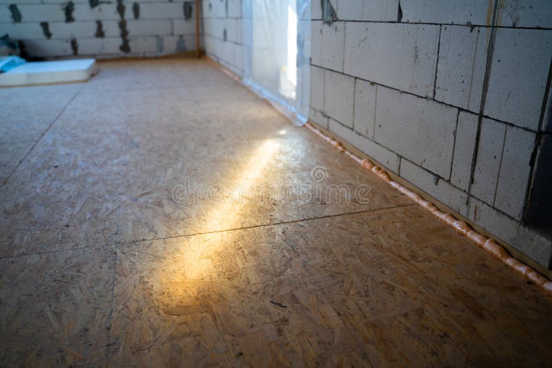 Light Beam on an Oriented Strand Board Subfloor. the First Leveling ...