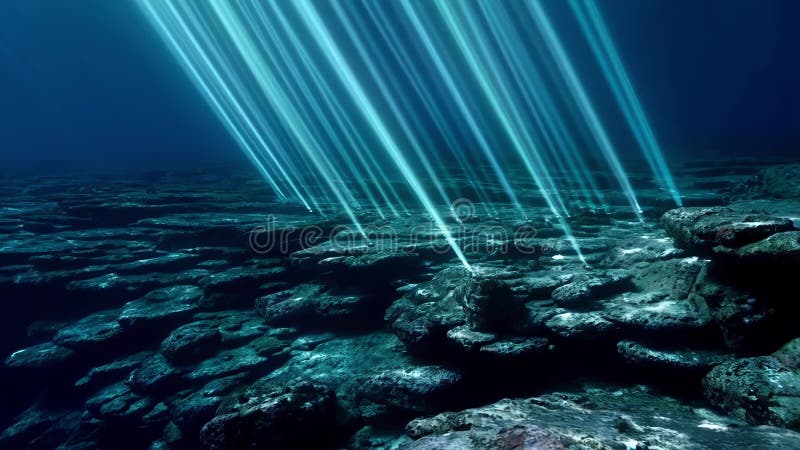 Light Beams Illuminating Underwater Rocks in Deep Ocean Stock Footage ...