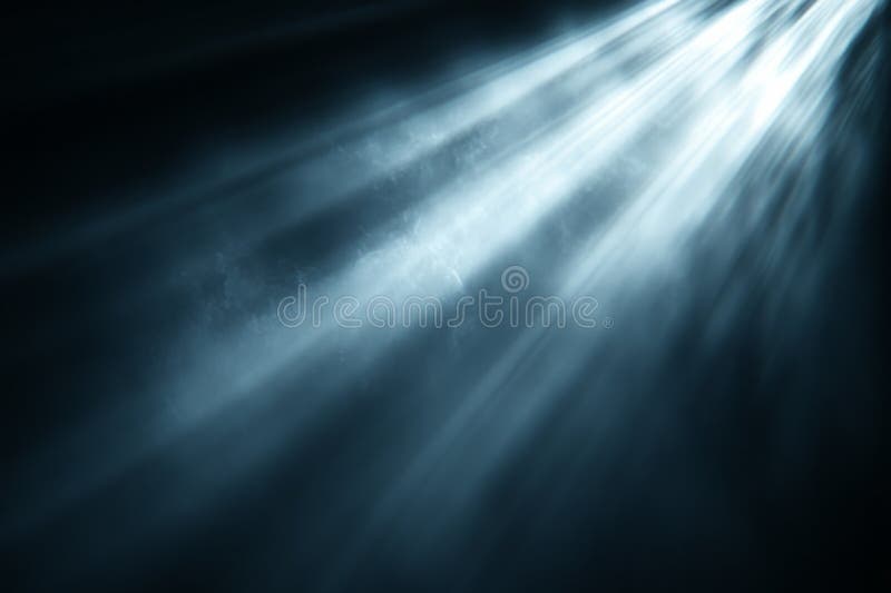 Light Beams Shining through Fog Create a Dramatic Atmosphere in a Dark ...