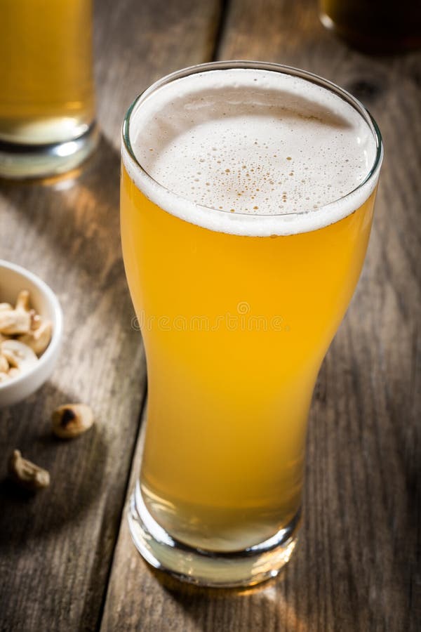 Light beer with snacks stock image. Image of alcohol - 56348469