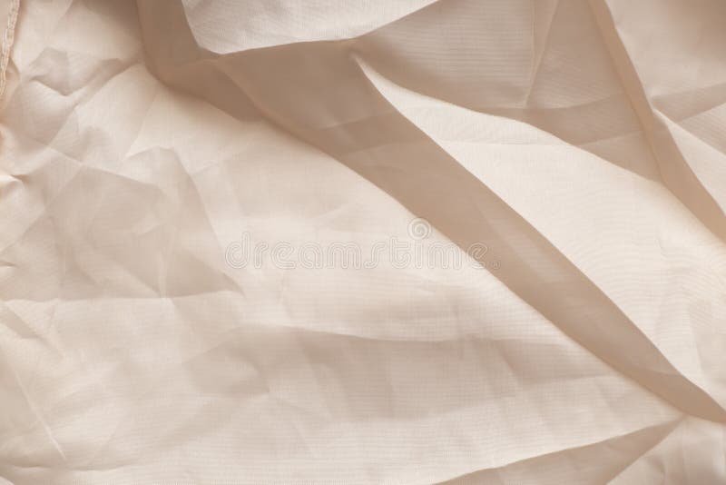 Light Beige Wrinkled Polyester Fabric As Background Close Up Stock ...