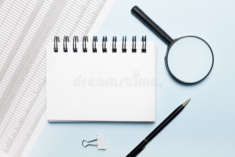 On a Light Blue Background, Reports, a Magnifying Glass, a Pen and a ...