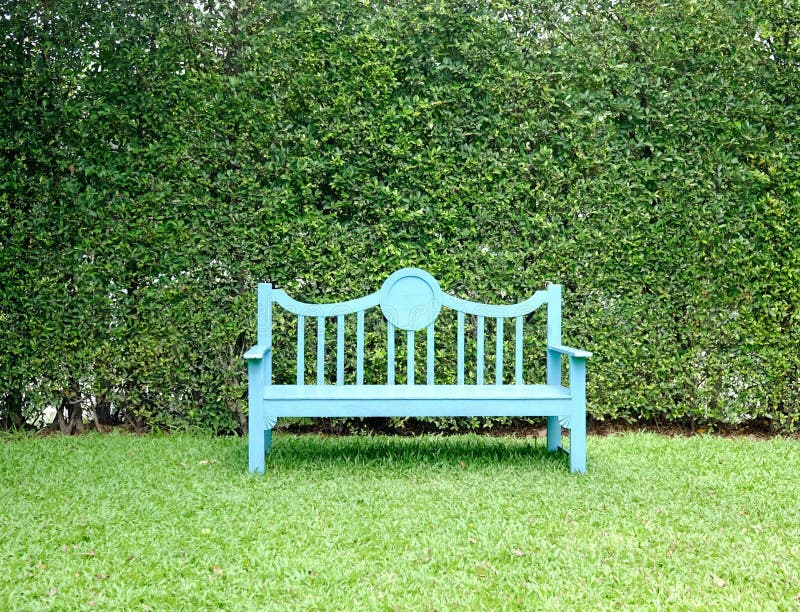 A Light Blue Bench in Garden on Leaves Background Stock Image - Image ...