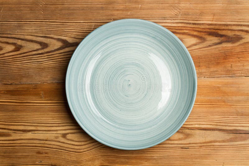 A light blue ceramic plate stock photo. Image of plate - 146215284
