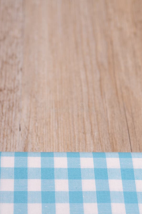 Light Blue Checkered Cloth with Blurred Wood Stock Image - Image of ...