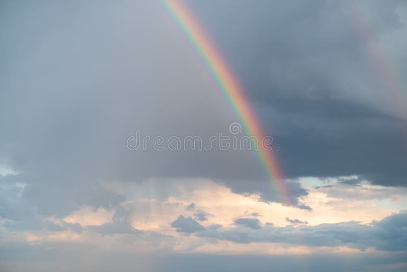 Light Blue Clouds and Rainbow on the Sky Stock Photo - Image of nature ...