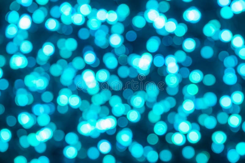 Light Blue, Cyan Colour Bokeh Lights on a Dark Background with Blue ...