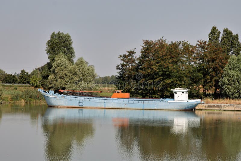 Lighter boat in Po river stock photo. Image of light - 98850004