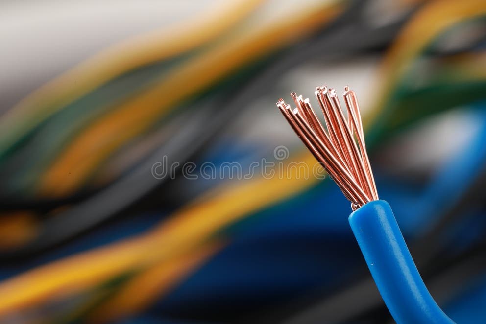 Light Blue Electrical Wire on Blurred Background, Closeup. Space for ...