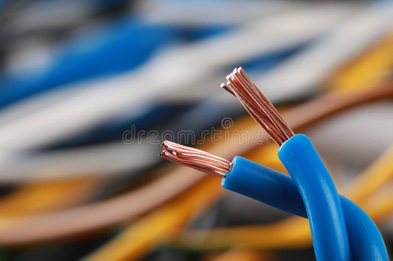 Light Blue Electrical Wire on Blurred Background, Closeup. Space for ...