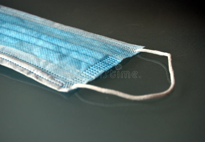 Blue Face Mask Detail with White String. Coronavirus Concept Stock ...