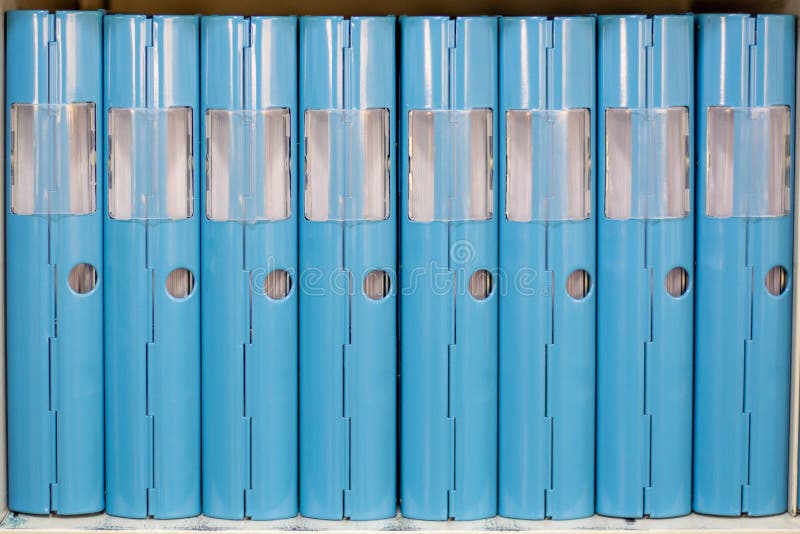 Light Blue Filing Folders on a Shelf Stock Photo - Image of paperwork ...