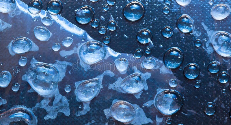 Light-blue Ice Particles and Blue Water Droplets are Located on a Blue ...