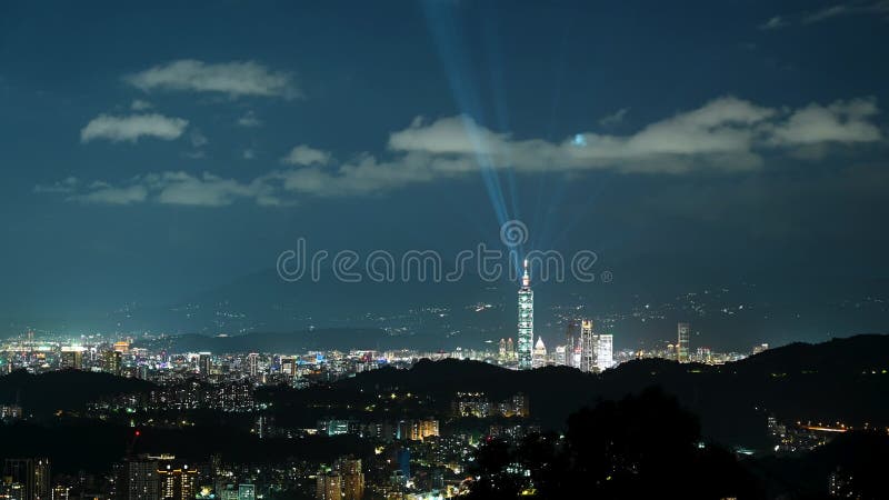 The Light from the Blue Lasers on Top of the Tower Shines in All ...