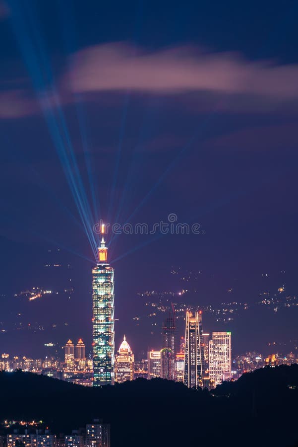 The Light from the Blue Lasers on Top of the Tower Shines in All ...