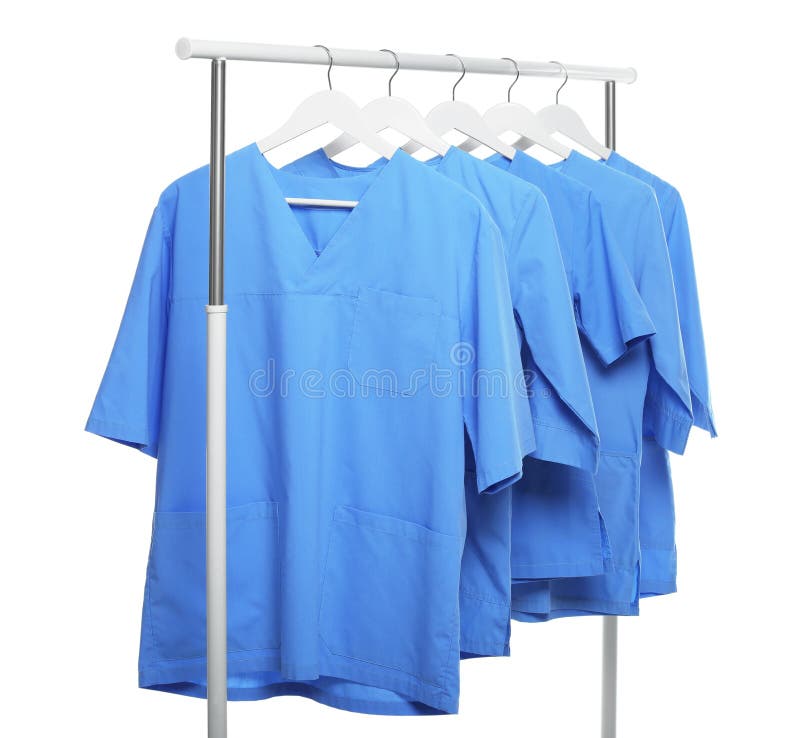 Light Blue Medical Uniforms on Rack Against White Background Stock ...