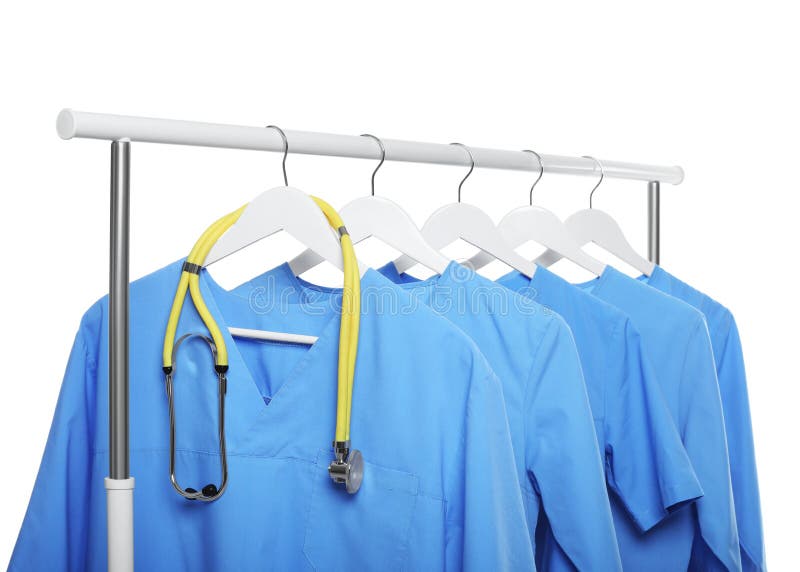 Light Blue Medical Uniforms and Stethoscope on Rack Against White ...