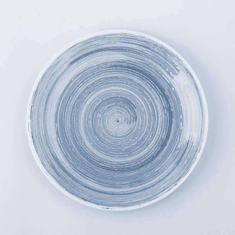 Light Blue Round Ceramic Plate with Spiral Pattern, Isolated Stock ...