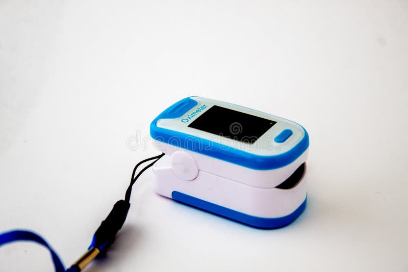 Blue Pulse Oximeter on White Background Stock Photo - Image of cardiac ...