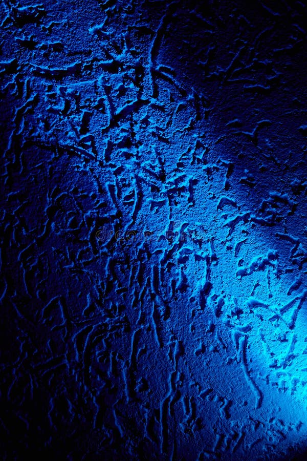 A Light Blue Ray of Light Diagonally Illuminates a Dark Blue Background ...