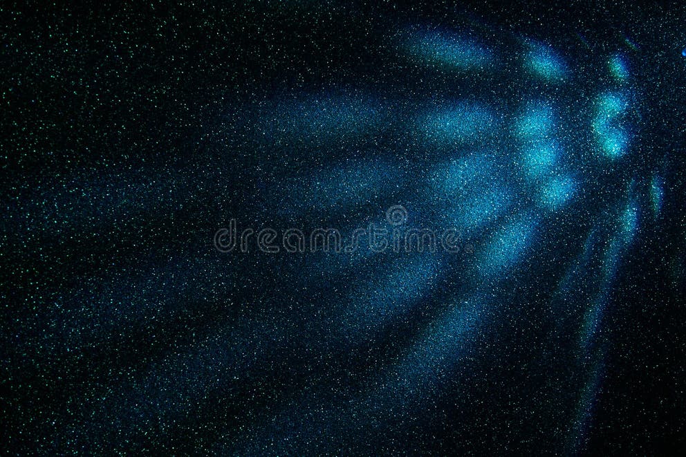 Light Blue Rays of Light on a Dark Background in Fine Red Grain Stock ...