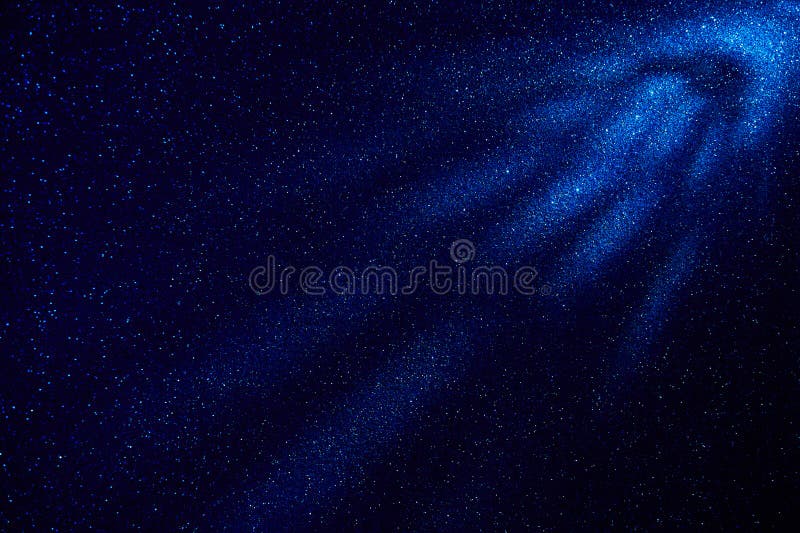 Light Blue Rays of Light on a Dark Blue Fine Grained Background Stock ...