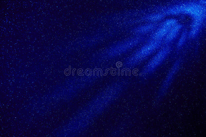 Light Blue Rays of Light on a Dark Blue Fine Grained Background Stock ...
