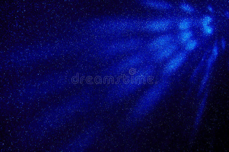 Light Blue Rays of Light on a Dark Blue Fine Grained Background Stock ...