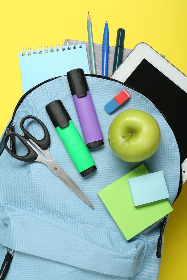 Light Blue School Backpack with Stationery, Apple and Tablet on Yellow ...