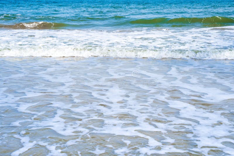 Light Blue Sea Waves on a Clean Sandy Beach Stock Photo - Image of ...