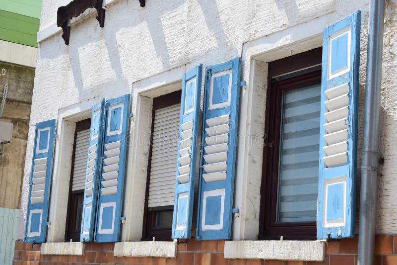 Light blue shutters stock photo. Image of lodging, residential - 321035808