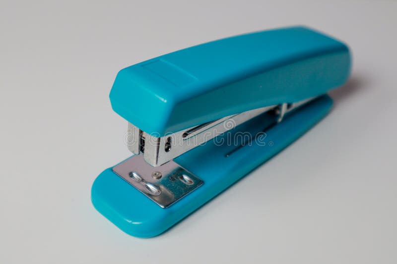A light blue staple stock image. Image of supplies, equipment - 310621875