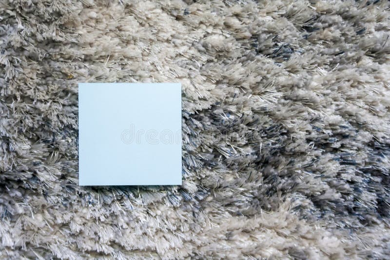 A Light Blue Sticky Note on a Textured Rug. Ideal for Office or Home ...