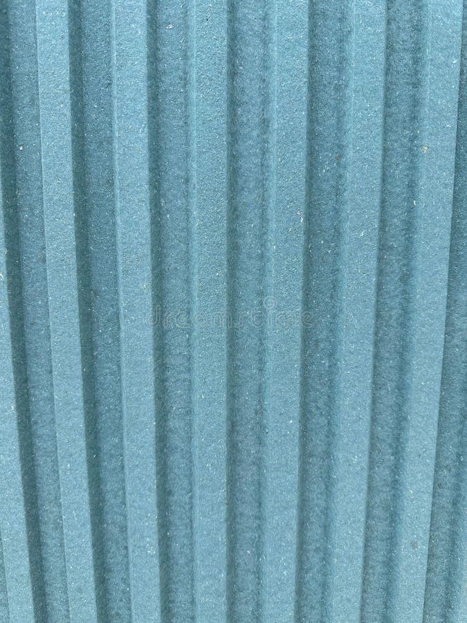 Light Blue Surface Featuring Vertical Ridges and a Slightly Rough ...