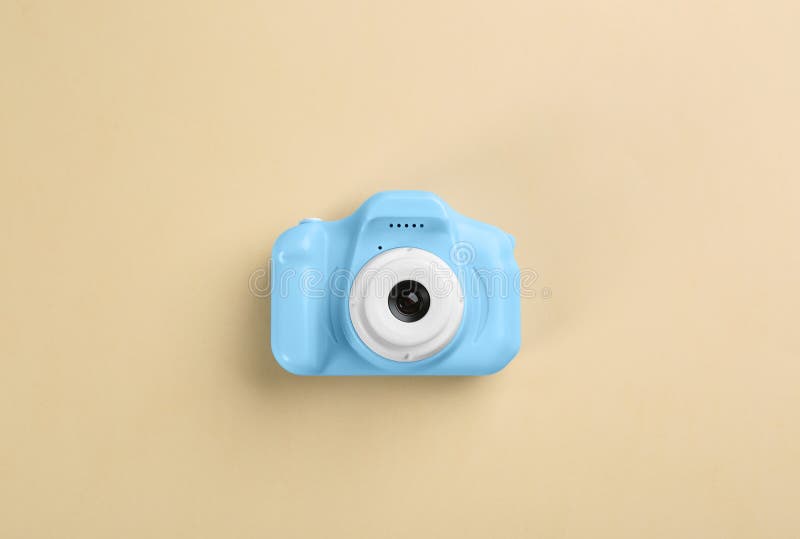 Light Blue Toy Camera on Beige Background Stock Photo - Image of talent ...