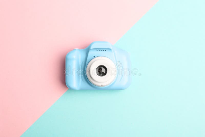 Light Blue Toy Camera on Color Background. Future Photographer Stock ...