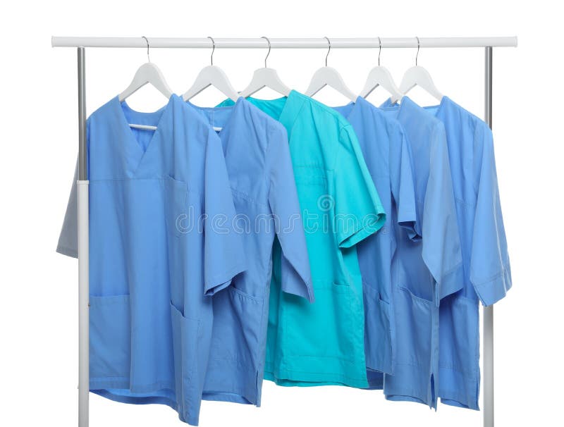 Light Blue and Turquoise Medical Uniforms on Rack Against White ...
