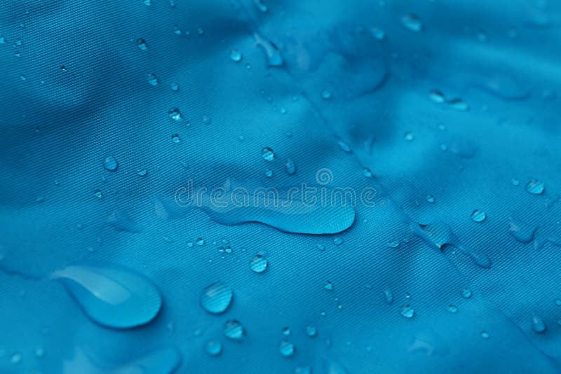 Light Blue Waterproof Fabric with Water Drops As Background, Closeup ...