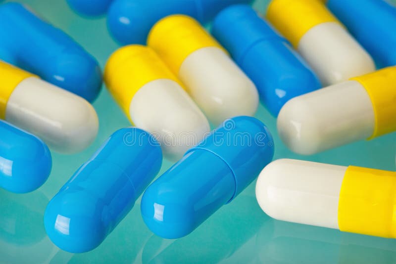 Light yellow pills stock photo. Image of stacked, drug - 1608174