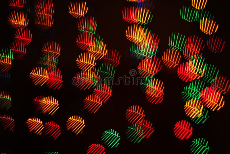 A Light Bokeh Pattern of Geometric Elements on a Dark Background Stock ...