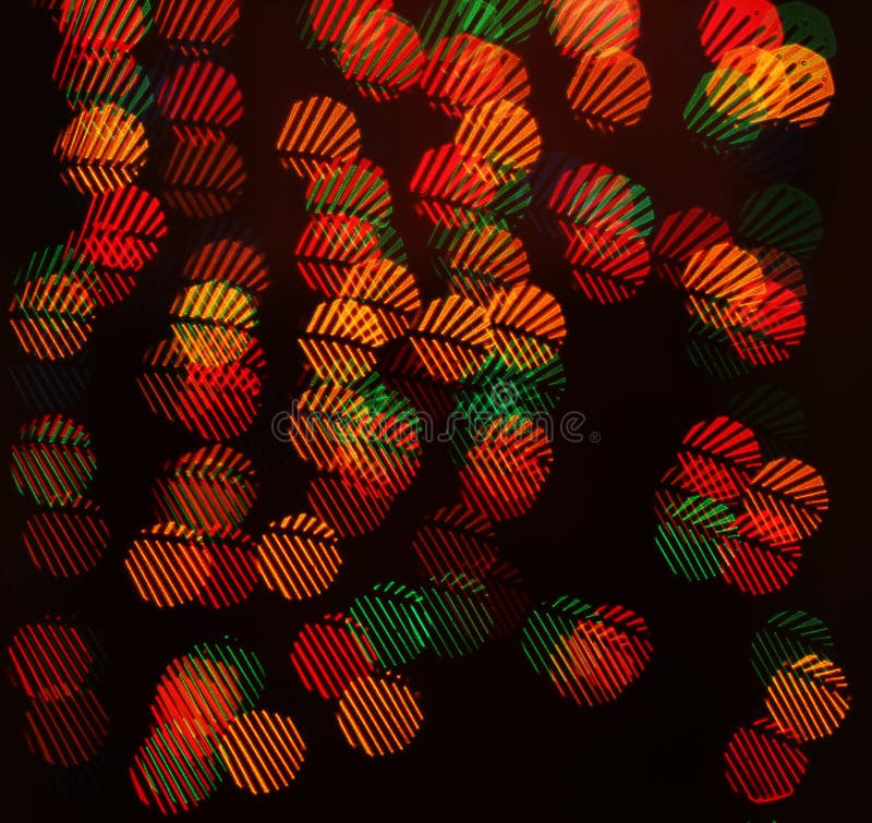 A Light Bokeh Pattern of Geometric Elements on a Dark Background Stock ...
