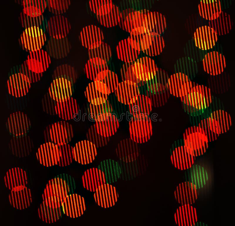 A Light Bokeh Pattern of Geometric Elements on a Dark Background Stock ...
