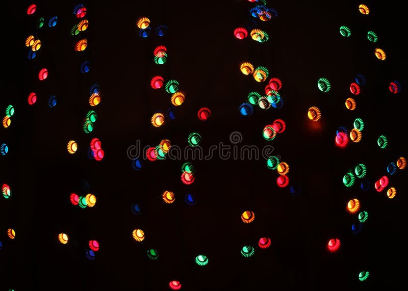 A Light Bokeh Pattern of Geometric Elements on a Dark Background Stock ...